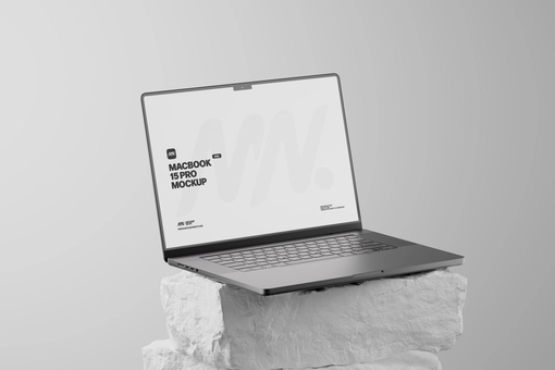 Macbook Pro On White Rock Mockup | Mockupnest