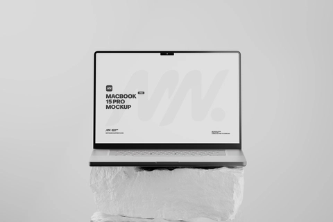 Macbook Pro On White Rock Mockup | Mockupnest