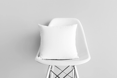 Square Pillow Mockup On Chair | Mockupnest