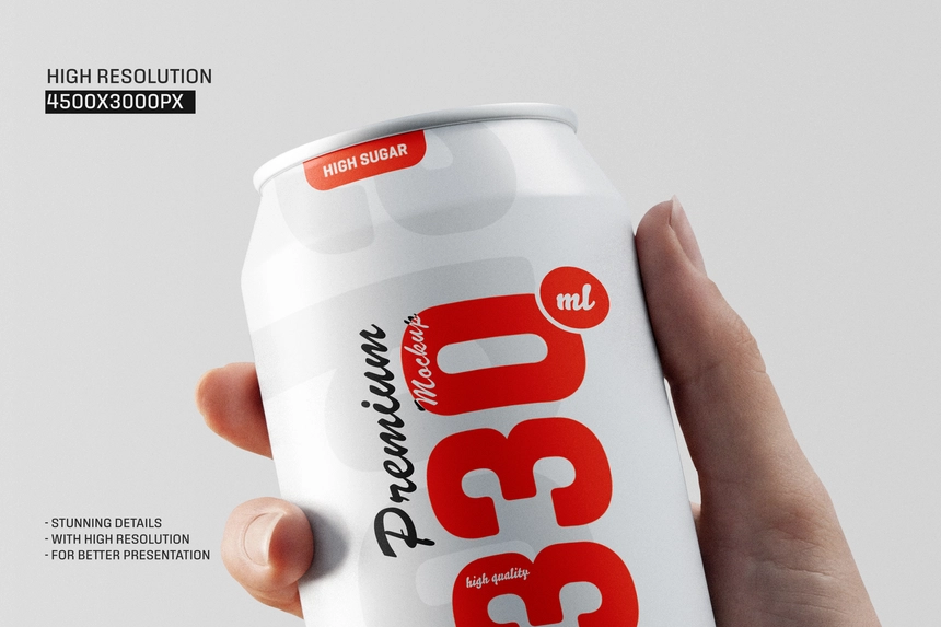 330ml Soda Can Holding By Hand Mockup | Mockupnest