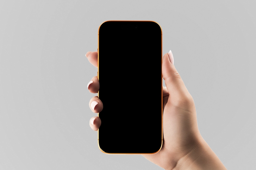 Orange iPhone 17 Pro In Hand Mockup | Mockupnest